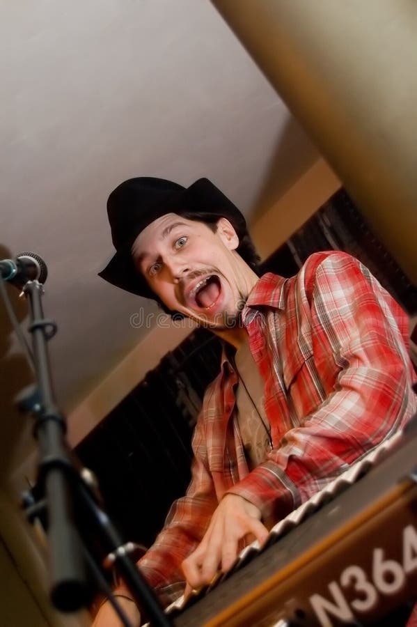 Singer with Synthesizer and Microphone Stock Photo - Image of person ...