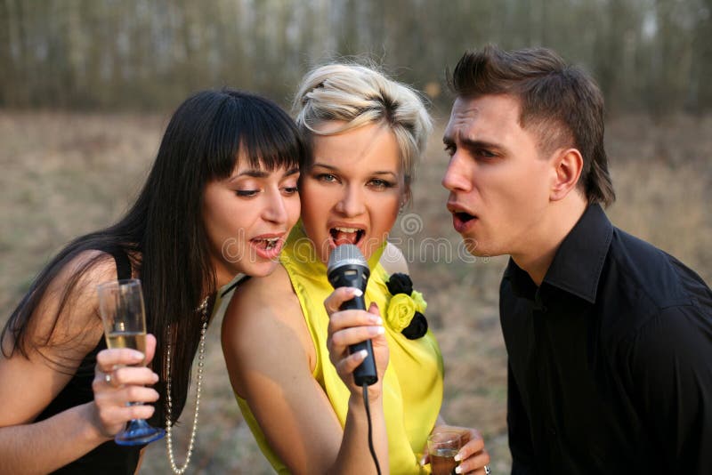 Singers trio stock image. Image of glass, handsome, females - 8309013