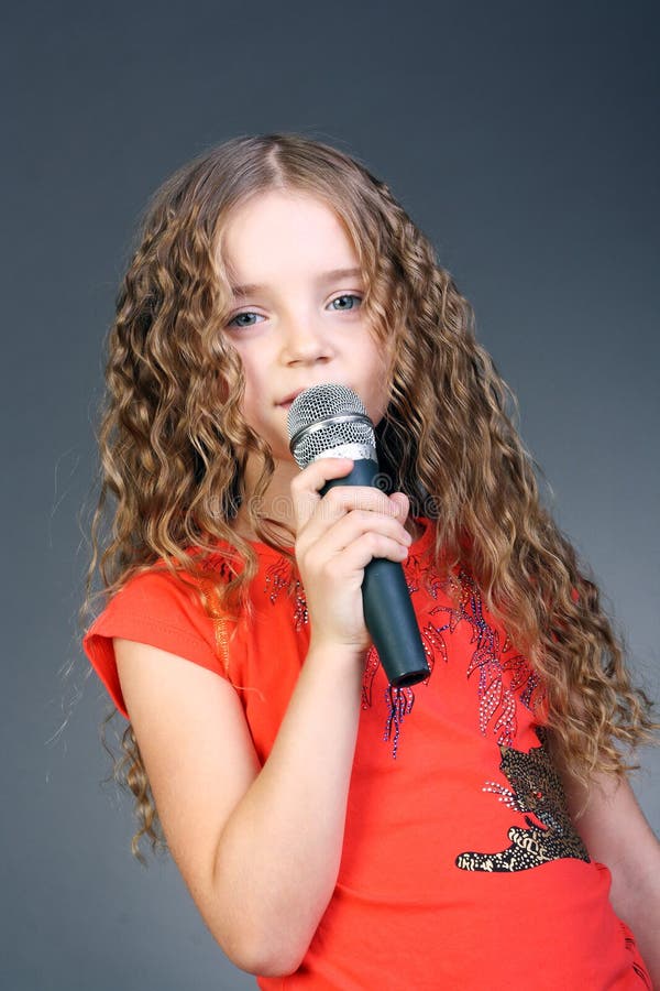 Singing stock image. Image of karaoke, hobby, face, child - 18446045