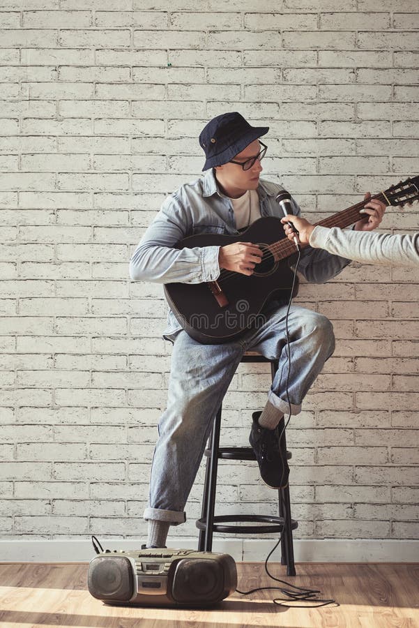 Singing man stock photo. Image of boombox, stool, microphone - 89520282