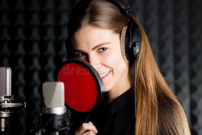 Singing Young Girl in Recording Studio. Stock Image - Image of dynamic ...