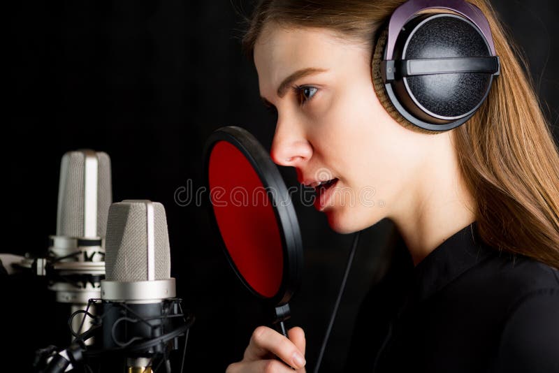 Singing Young Girl in Recording Studio. Stock Photo - Image of ...