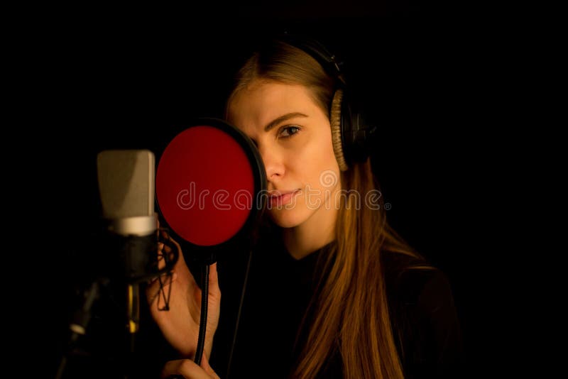 Singing Young Girl in Recording Studio. Stock Photo - Image of ...