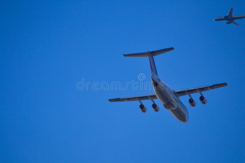 Single Airplane Flying in the Blue Sky Stock Photo - Image of ...
