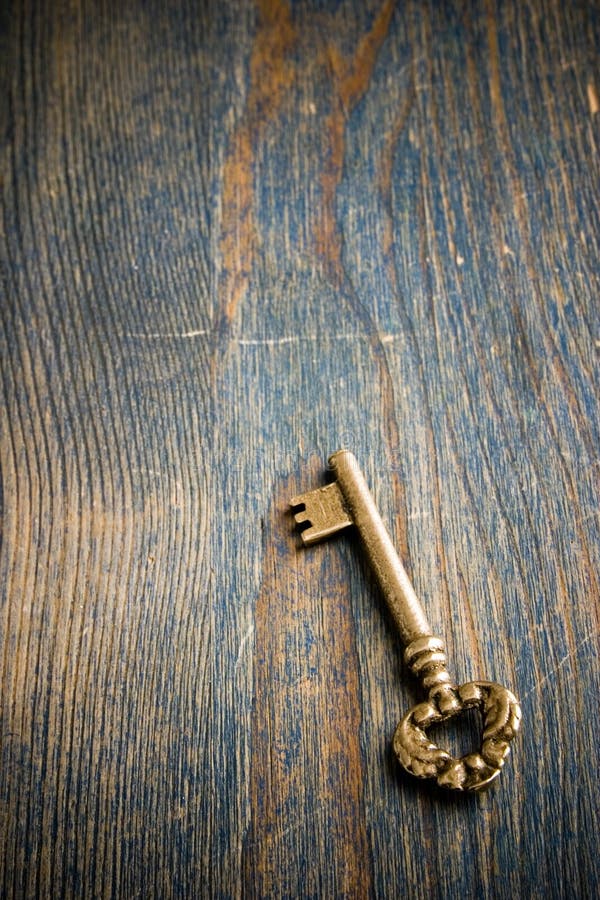 Antique Skeleton Key on Old Distressed Wood Planks Stock Image - Image ...