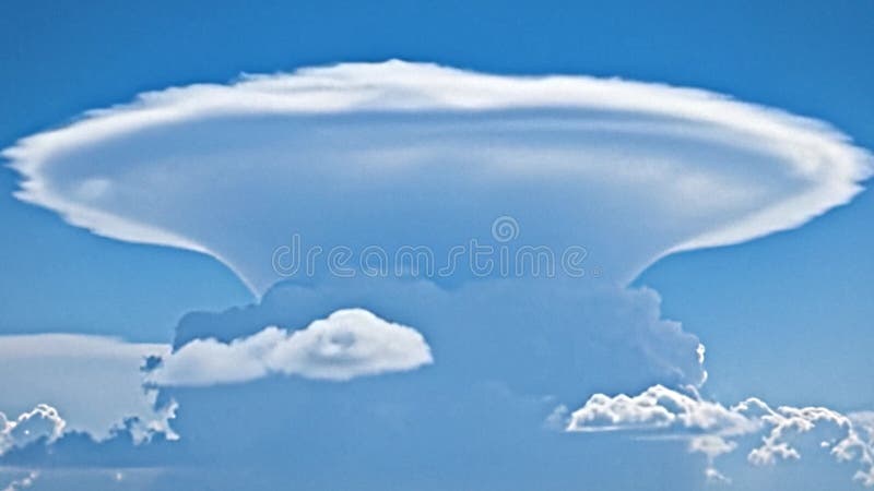 A Single, Anvil-shaped Cloud Dominates the Horizon, Its Flat Top ...