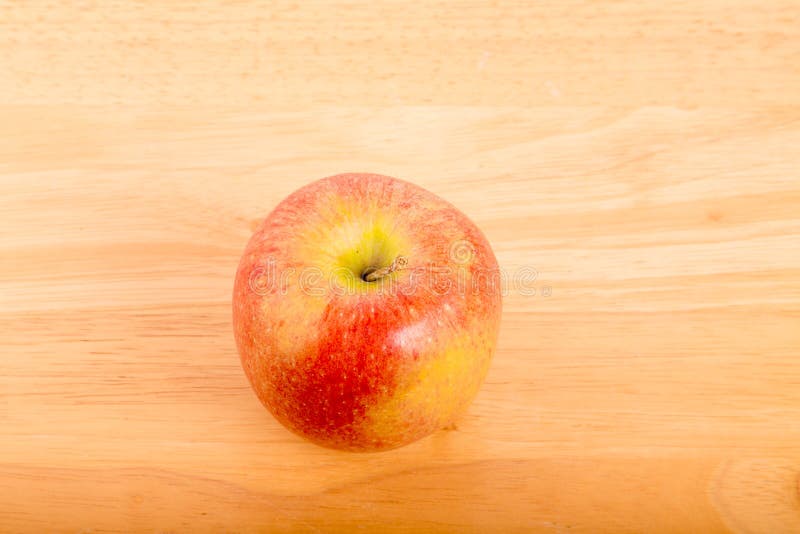 Single Apple on a Wood Table Stock Photo - Image of ripe, nature: 37229792