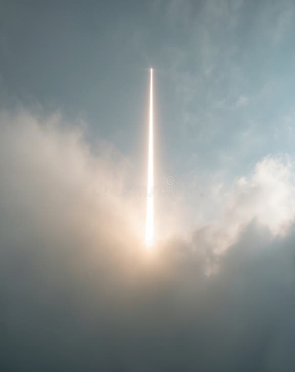 A Single Beam of Light Shining through the Mist and Cloud Stock Image ...