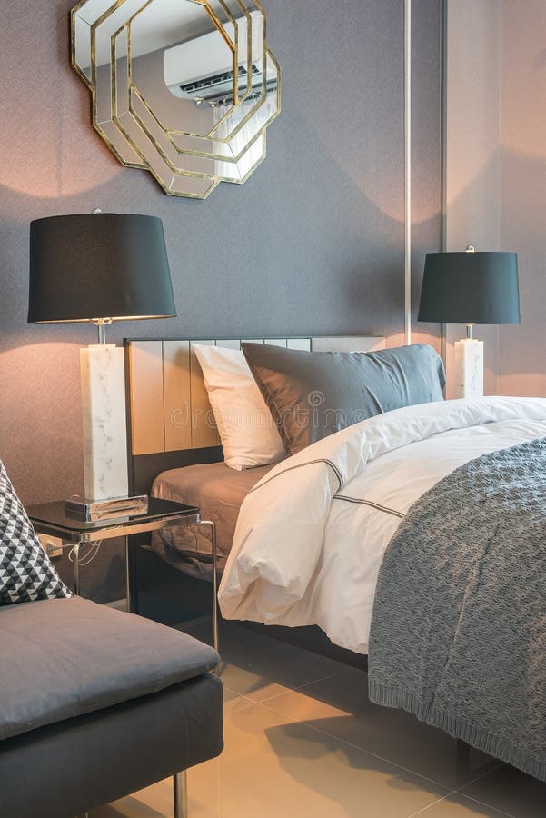 Single Bed with Black Lamp in Classic Style Bedroom Stock Photo - Image ...