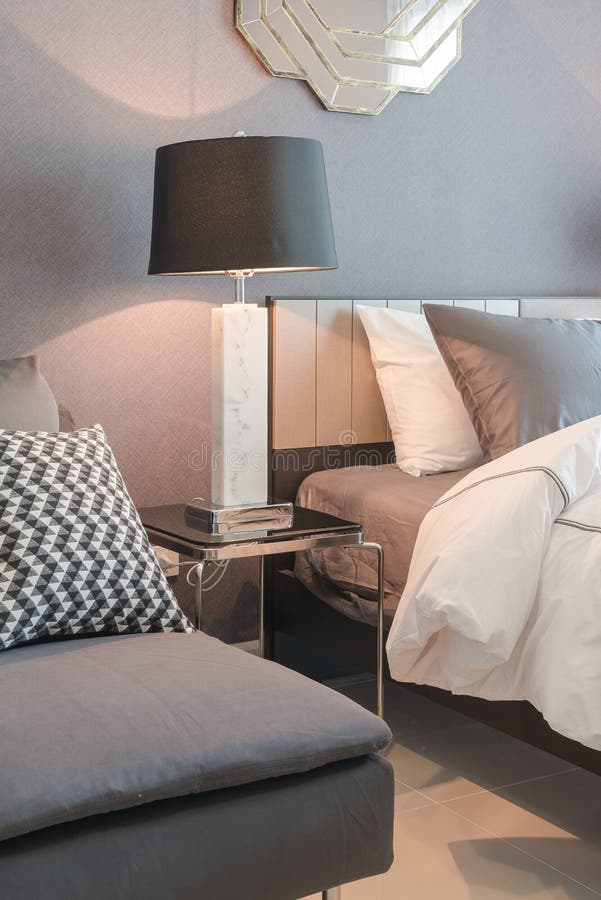 Single Bed with Black Lamp in Classic Style Bedroom Stock Photo - Image ...