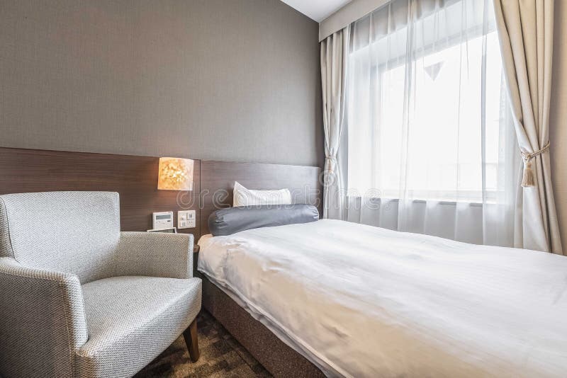 Single Bed in Modern Small Bedroom Stock Image - Image of beige ...