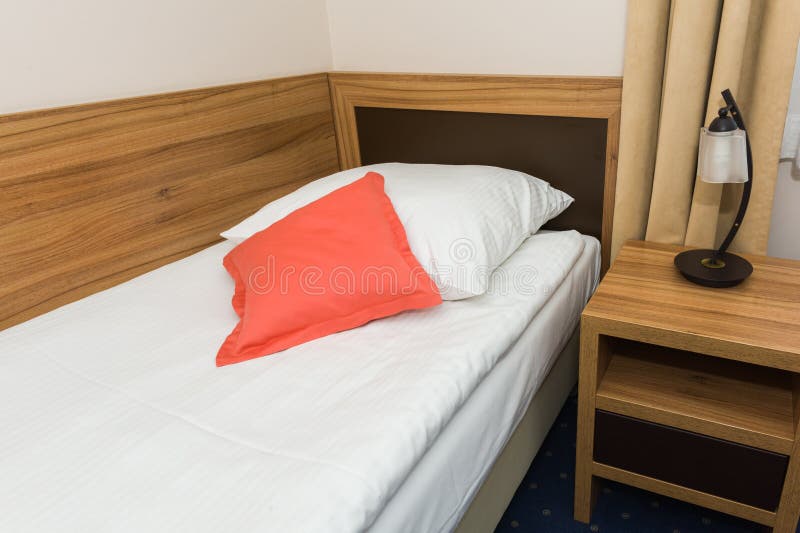 Single Bedroom in Cheap Hotel Stock Image - Image of light, lamp: 54834623