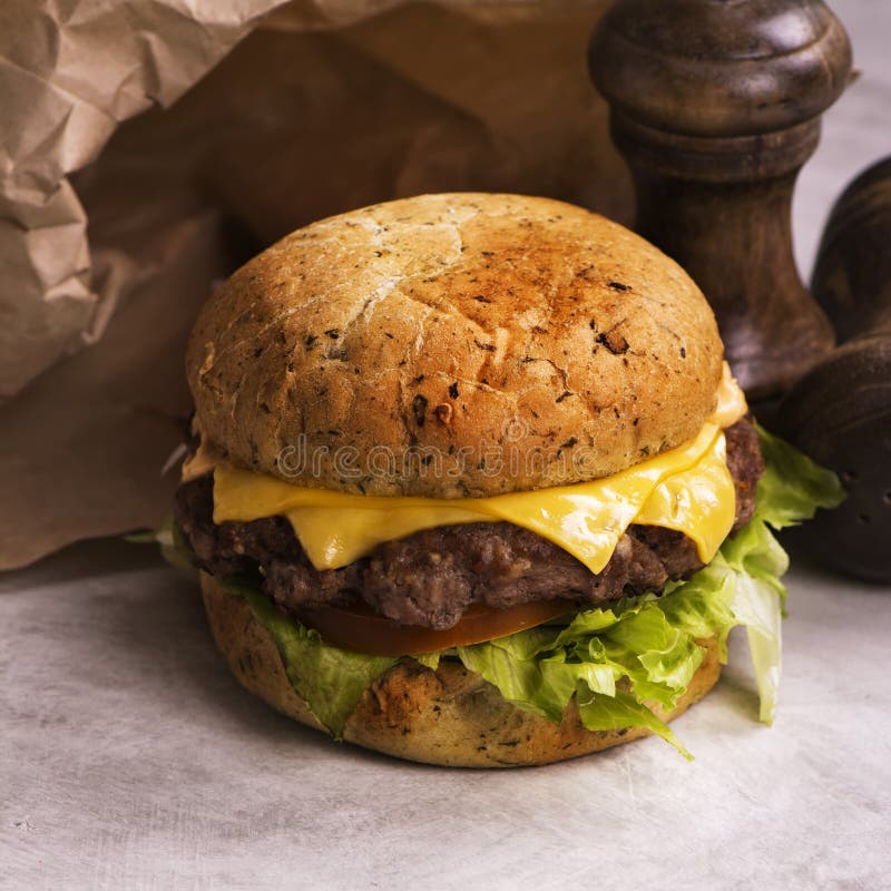 Single beef cheeseburger stock photo. Image of beef, popular - 70782900