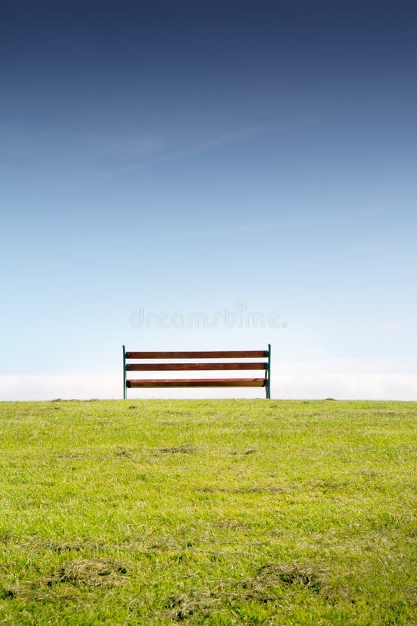 Single bench on grass stock photo. Image of outdoors - 198212034