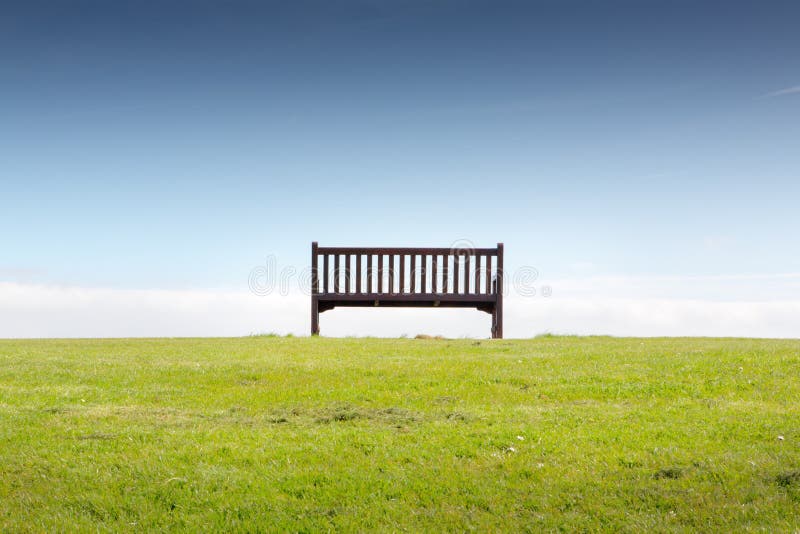 Single bench on grass stock photo. Image of outdoor - 198212140