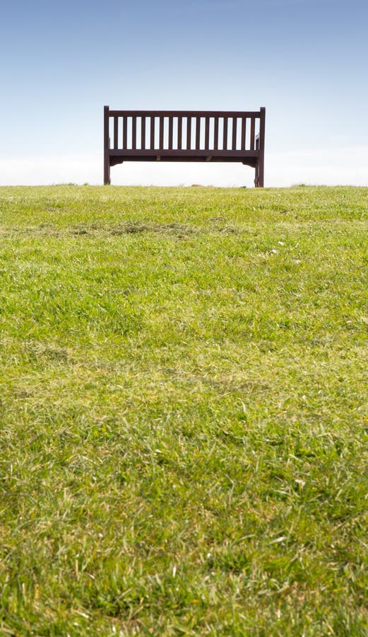 Single bench on grass stock photo. Image of grass, furniture - 198212230