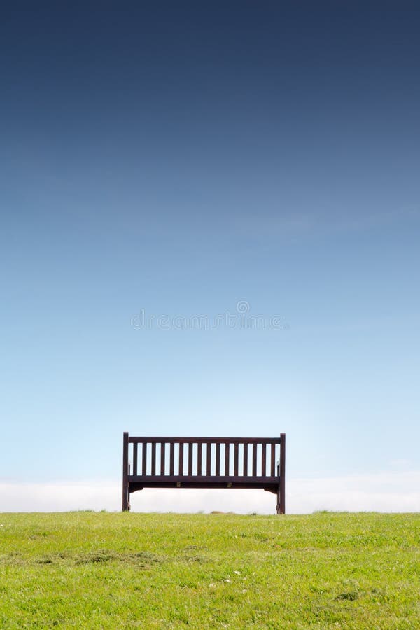 Single bench on grass stock photo. Image of outdoors - 198212034