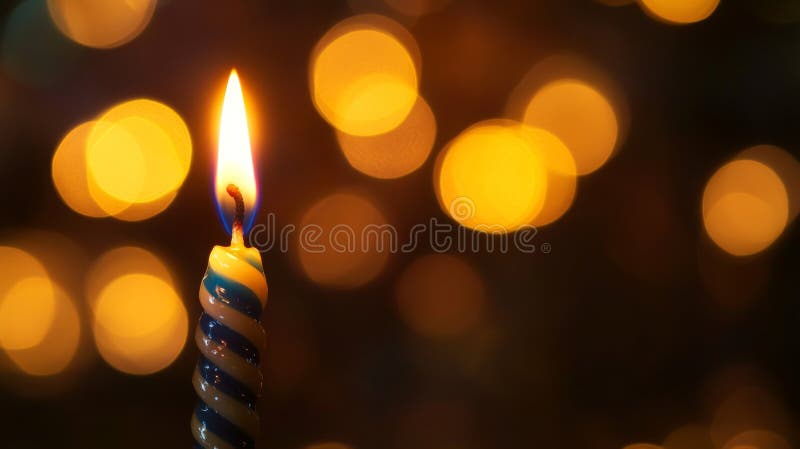 A Single Birthday Candle with a Blurred Background of Yellow Lights ...
