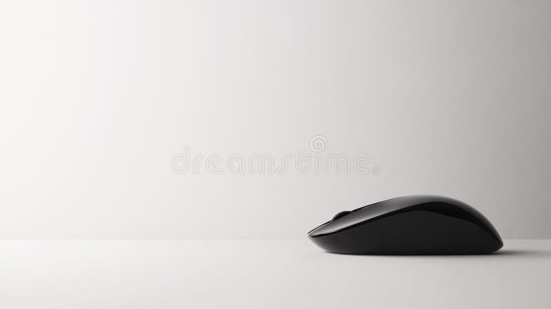 A Single Black Computer Mouse Sitting on a White Surface, Ready for Use ...
