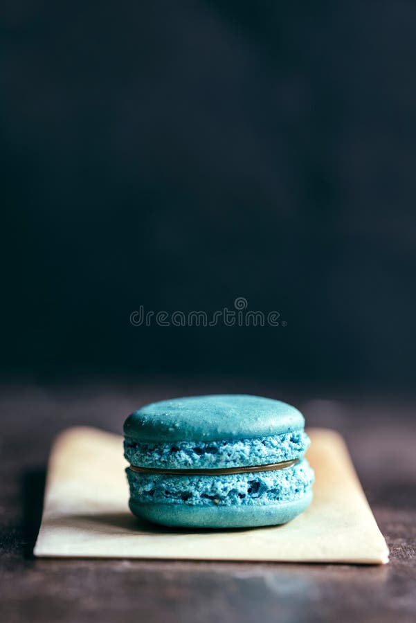 Single blue macaroon stock photo. Image of candy, gourmet - 65554892