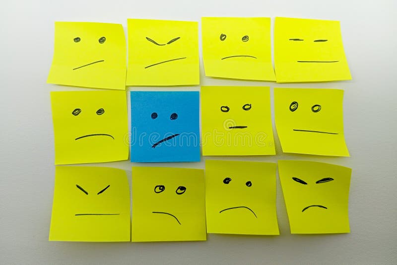 A Single Blue Sticky Note with a Sad Face is Arranged in the Center of ...