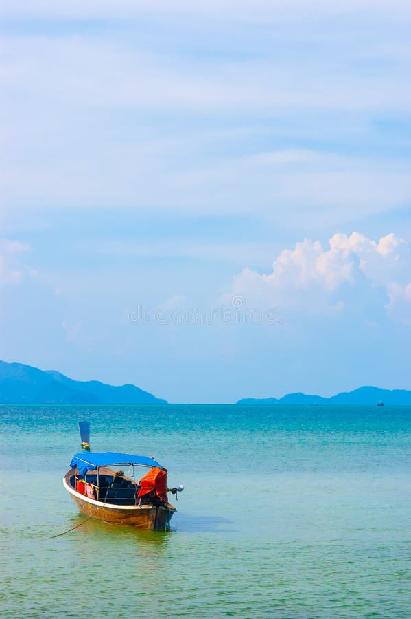 Boat in a Peaceful Sea and Blue Sky Stock Image - Image of ocean, clear ...