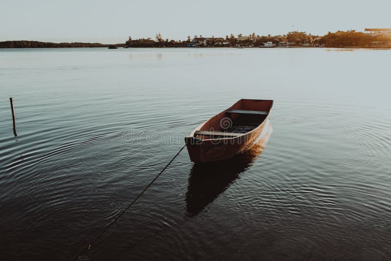 Single Boat Floating on a Calm Lake Stock Image - Image of river, alone ...