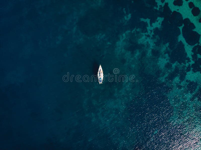 Single Boat in the Middle of Clear Blue Sea Stock Image - Image of ...