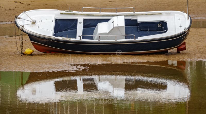 Single Boat Over the Sand on Low Tide Stock Photo - Image of isolated ...