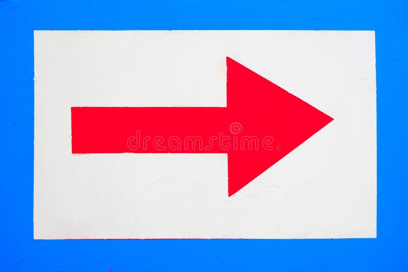 Red Arrow on White and Blue Background Stock Photo - Image of sign ...