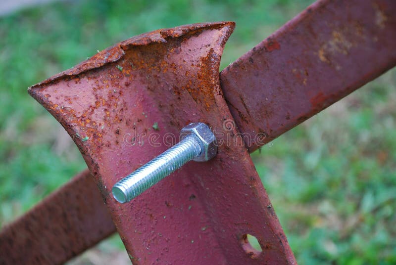 A Single Bolt Holding a Pair of Rusty Angle Bar Structure Stock Photo ...