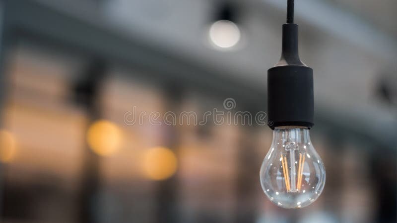 Single Bulb in Office Building Stock Photo - Image of idea, lightoff ...