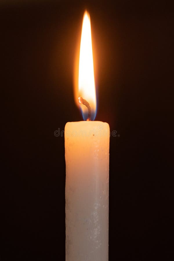 Single Burning Candle in the Foreground Stock Photo - Image of fire ...