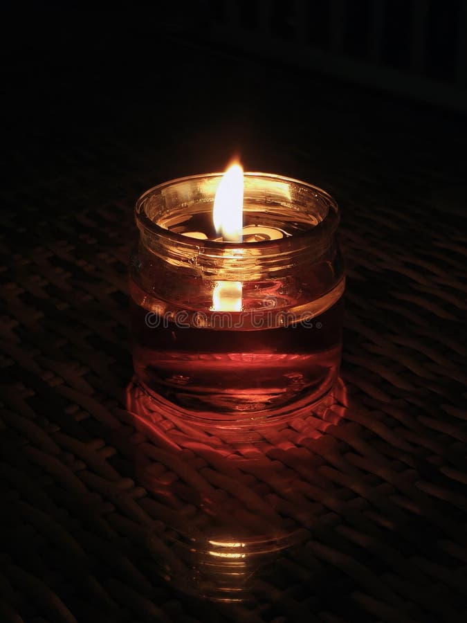 Single Candle Adorning a Pink Frosted Birthday Cake on a White Plate ...