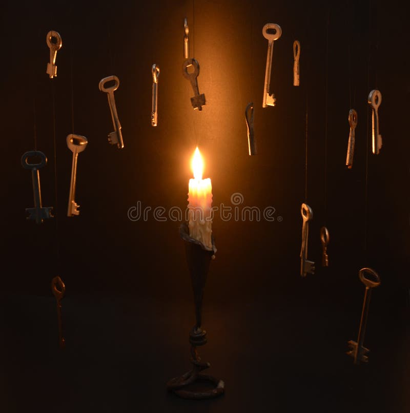 Single Candle with Hanging Keys Stock Image - Image of magic, nostalgia ...