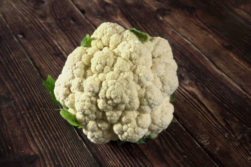Single Cauliflower Vegetable Head on Dark Wooden Table Stock Image ...