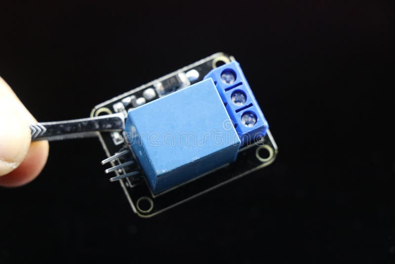 Single Channel Relay Module Isolated on Black Background, Electronic ...