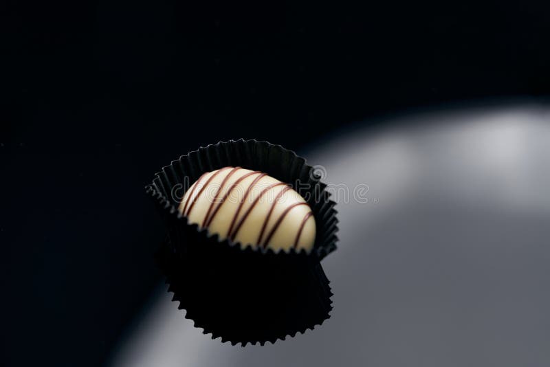 Single Chocolate Candy on Glazed Surface Stock Image - Image of organic ...