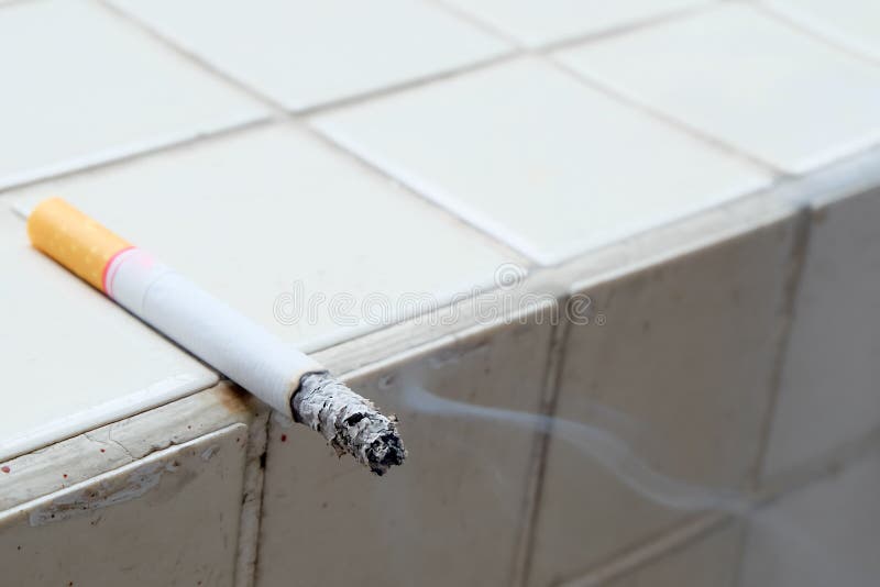 Single cigarette with ash stock image. Image of habit - 74172295