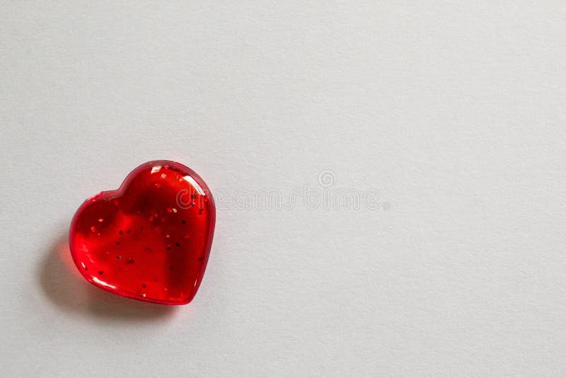 Single Clear Red Heart on White Background with Handwritten Note Stock ...