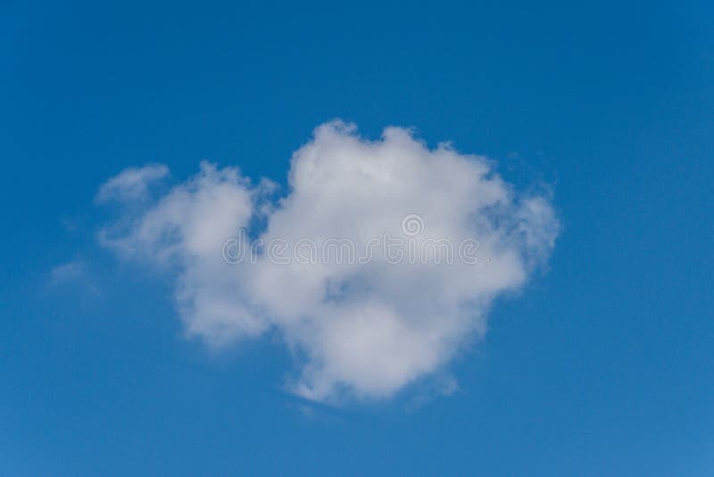 A Single Cloud in a Blue Sky Stock Image - Image of clear, flying ...