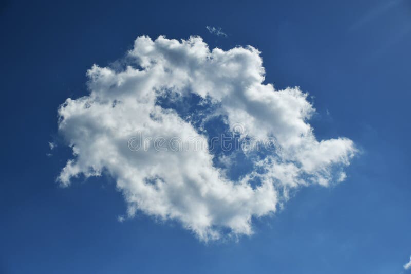 A Single Cloud, Cloud with a Hole, Cumulus Fractus Stock Photo - Image ...