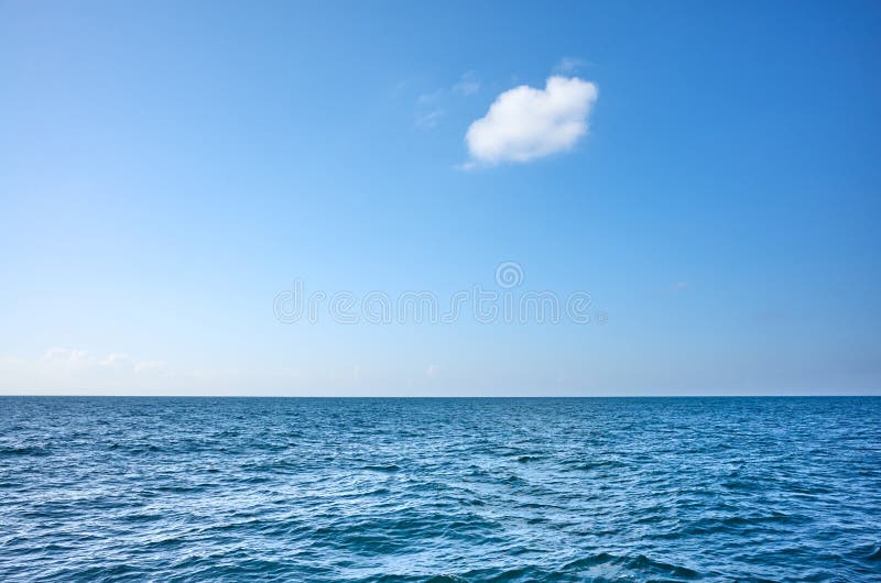 Single Cloud Over the Ocean on a Sunny Day Stock Image - Image of water ...