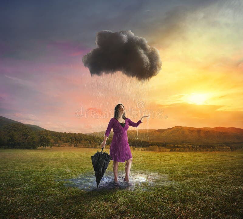 Single Cloud Raining on a Woman Stock Photo - Image of dress, grass ...