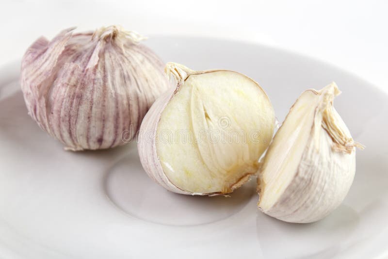 Single clove garlics stock photo. Image of garlics, white - 66848544