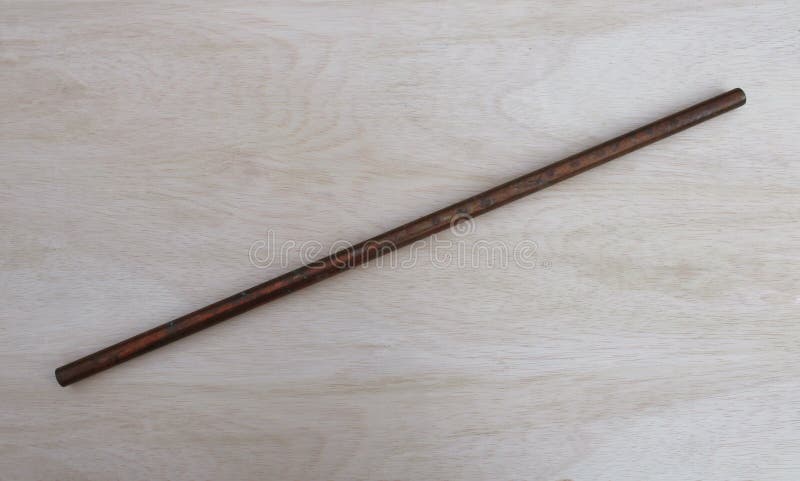 A Single Copper Pipe on a Wood Background Stock Image - Image of dirty ...