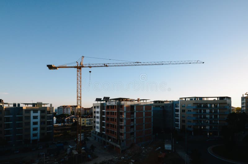 Single Crane at Night on Construction Site Stock Image - Image of ...