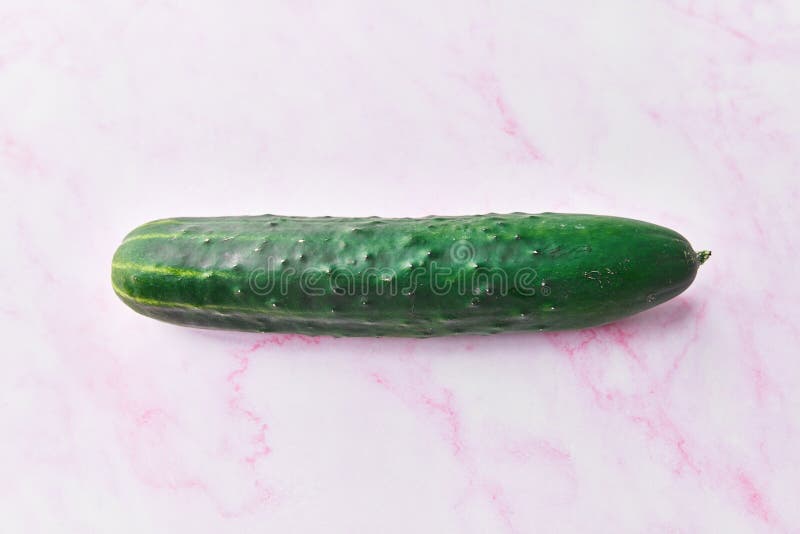 Single Cucumber on a Marble Surface Stock Photo - Image of nutrition ...