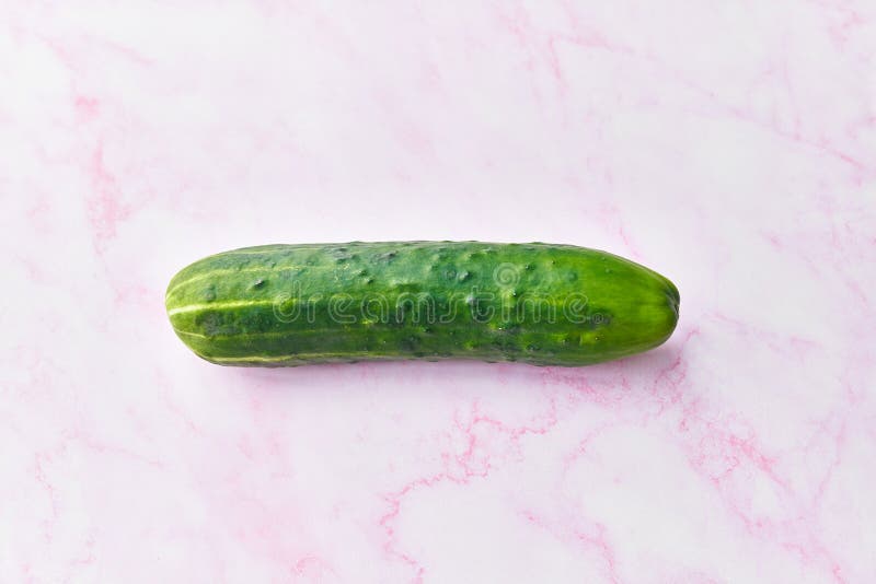 Single Cucumber on a Marble Surface Stock Photo - Image of vegetable ...