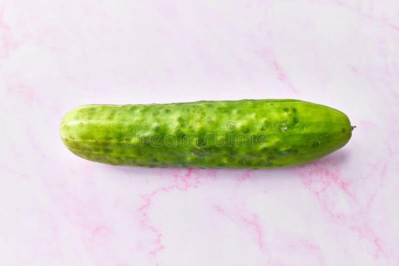 Single Cucumber on a Marble Surface Stock Photo - Image of organic ...
